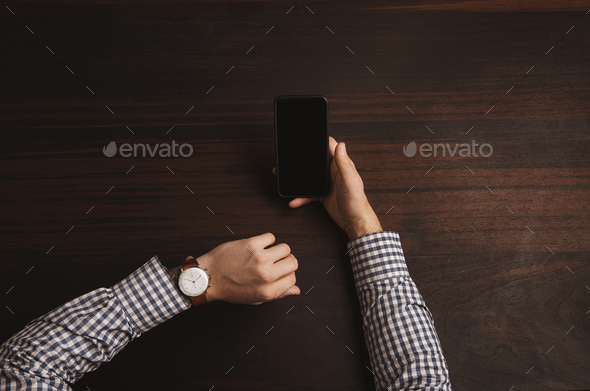 Accountant looking time on his classic silver watch Stock Photo by ...
