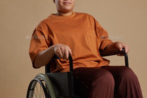 Modern Wheelchair User in Studio Stock Photo by seventyfourimages ...