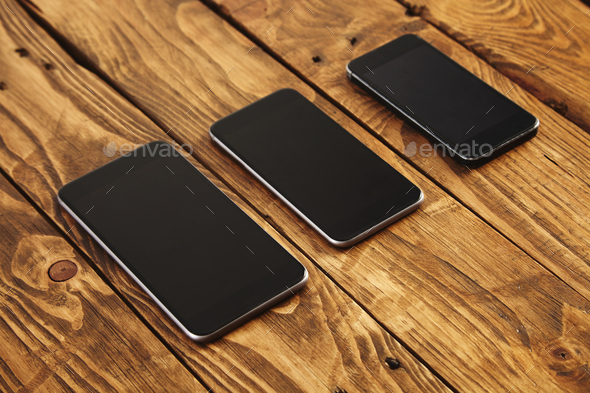 Different generations of modern smartphones isolated Stock Photo by ...