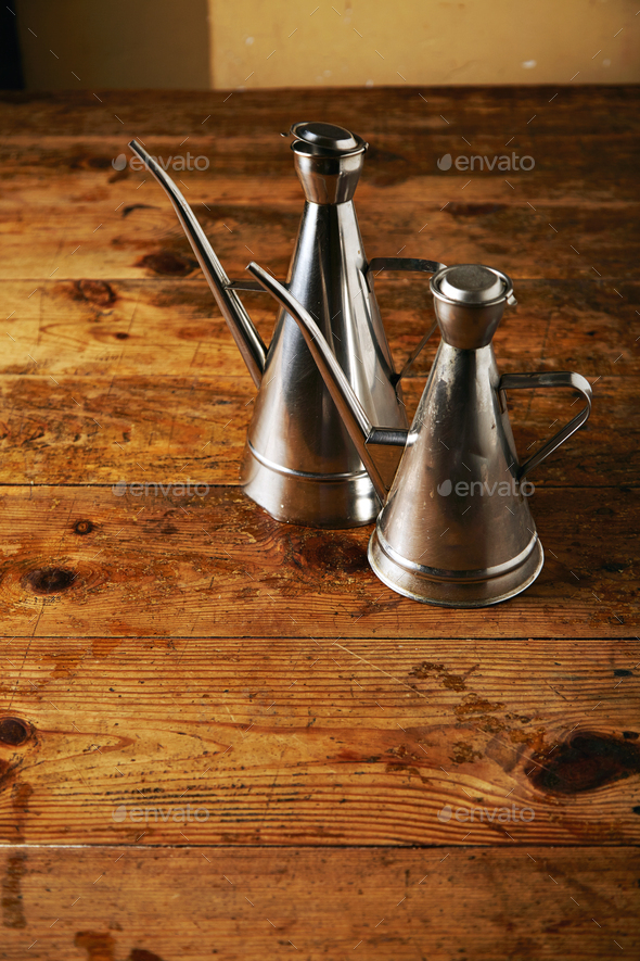 Stainless steel oil containers Stock Photo by bublikhaus | PhotoDune