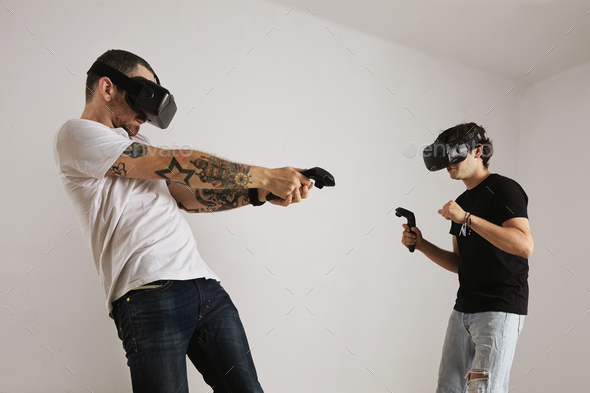 Two men fighting in VR glasses Stock Photo by bublikhaus | PhotoDune