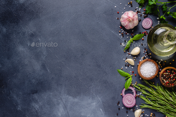 Herbs and condiments on black stone background. Stock Photo by tatiana ...