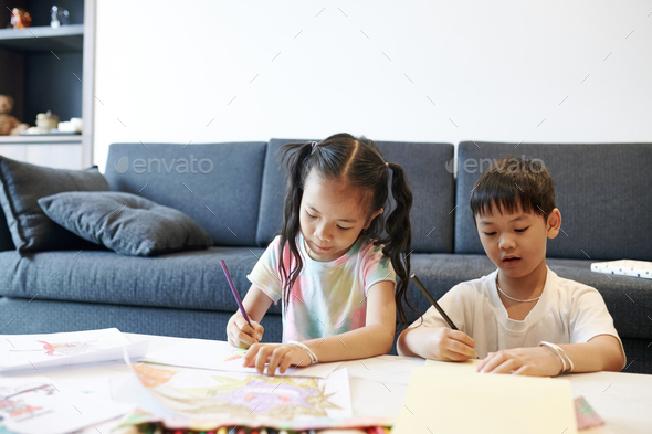 Siblings drawing pictures Stock Photo by DragonImages | PhotoDune