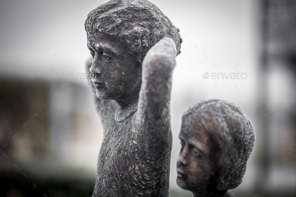 Statues of children playing musical instruments Stock Photo by puhimec