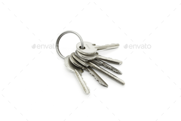 Silver keys on the ring on white background Stock Photo by didesign