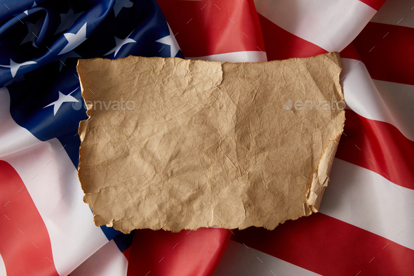 elevated view of vintage blank crumpled paper on american flag Stock ...