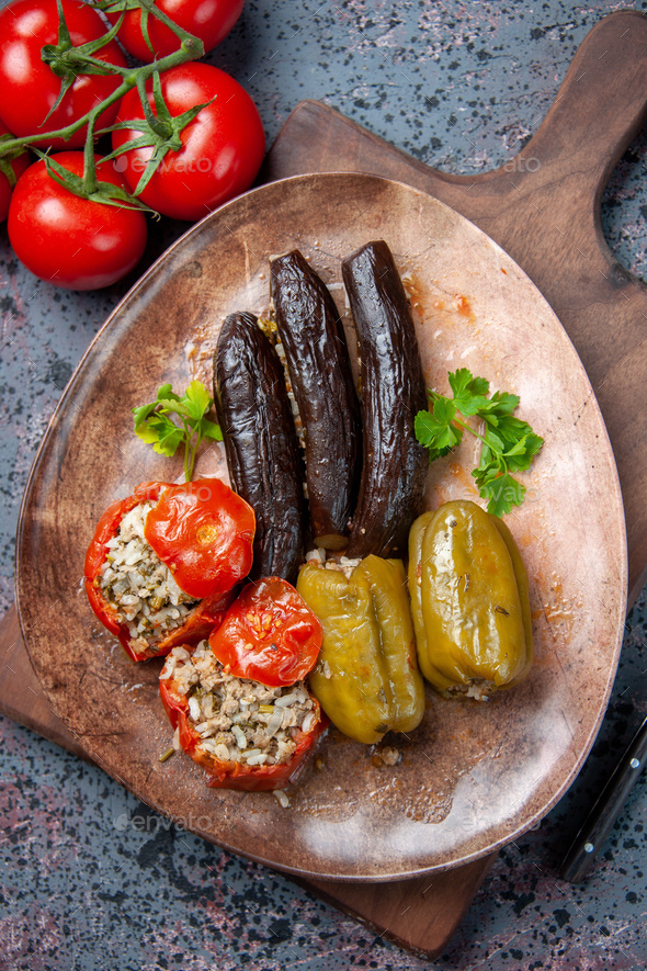 top view delicious vegetable dolma with salad on blue background food ...