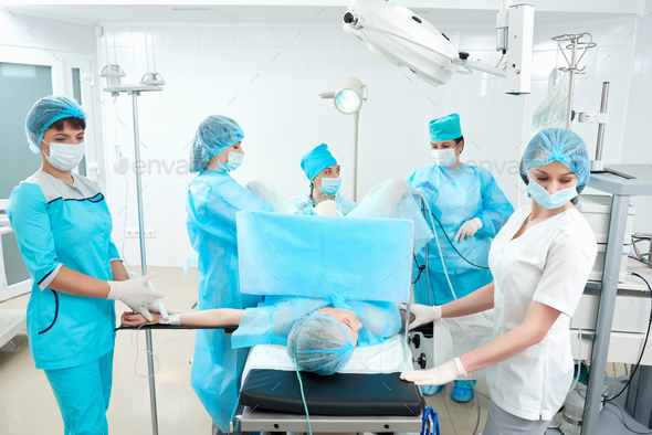 Operation in progress at the hospital Stock Photo by serhiibobyk ...