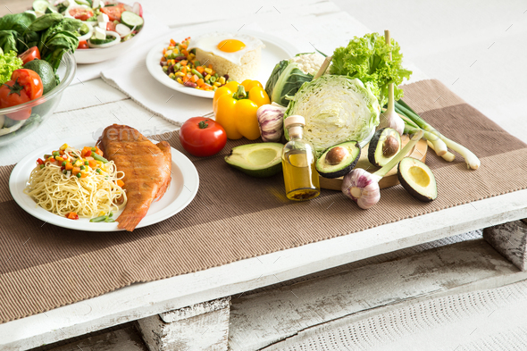 Organic healthy food on the dining table Stock Photo by puhimec | PhotoDune