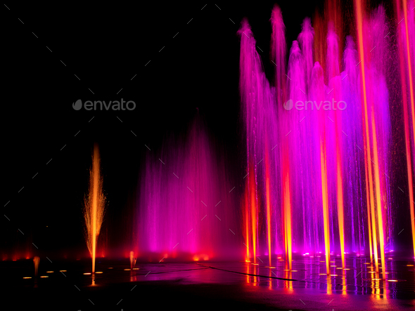 colored decorative dancing water jet led light fountain show at night ...