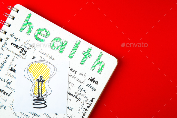 top view health writing with different other notes and lightbulb ...