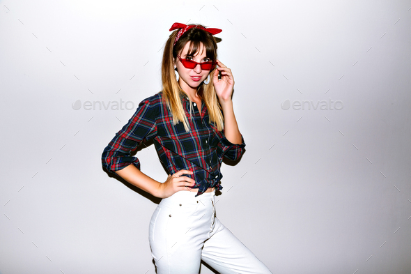 Positive indoor flash portrait of playful cheeky hipster woman Stock ...