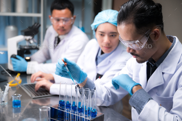 Scientific researchers team are working in the laboratory Stock Photo ...