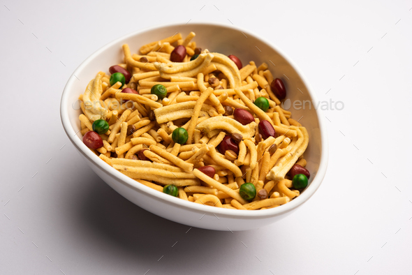 Bombay mix also known as Chanachur or Chiwda or farsan served in a bowl ...