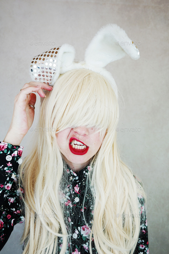 Blond and funny woman wearing rabbit ears Stock Photo by nanihta ...