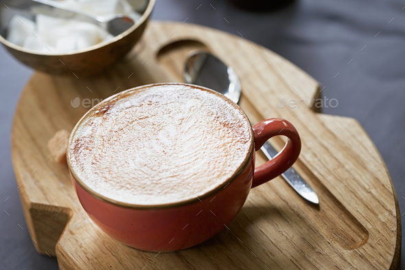 Cup of coffee on a table Stock Photo by svittlana | PhotoDune