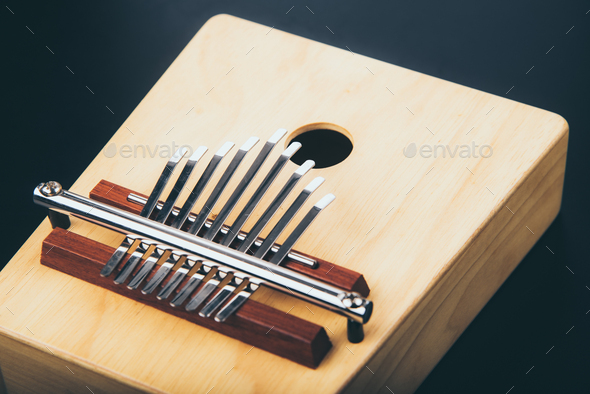 vintage acoustic Kalimba percussion music instrument, made from wooden ...