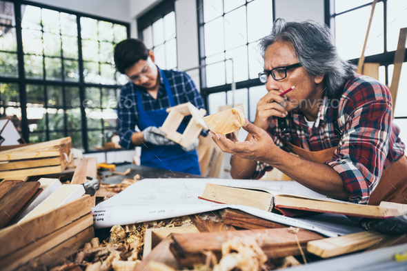carpenters team work together creatively, creative carpenter Stock ...