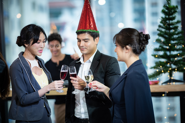 Toast to success. Group of business people toasting with champagne ...