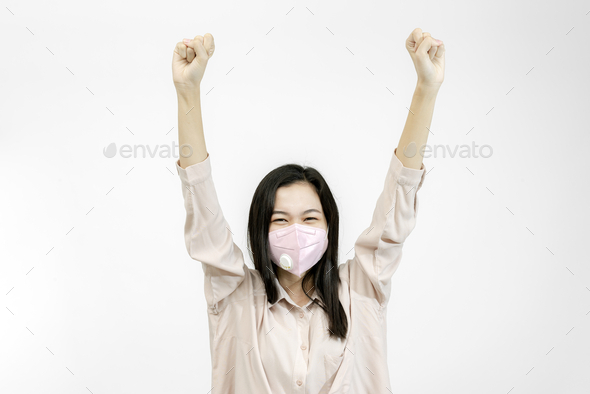 Asian woman wearing a mask raising her hands up Stock Photo by Rawpixel
