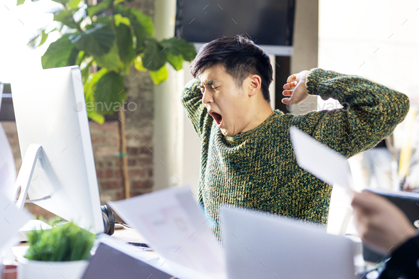 Sleepy office worker at his workstation Stock Photo by Rawpixel | PhotoDune