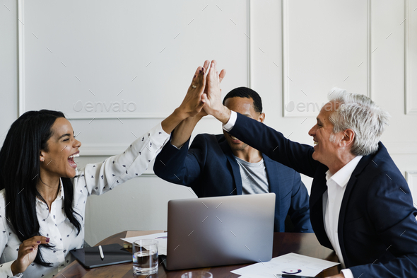Team making a high five Stock Photo by Rawpixel | PhotoDune