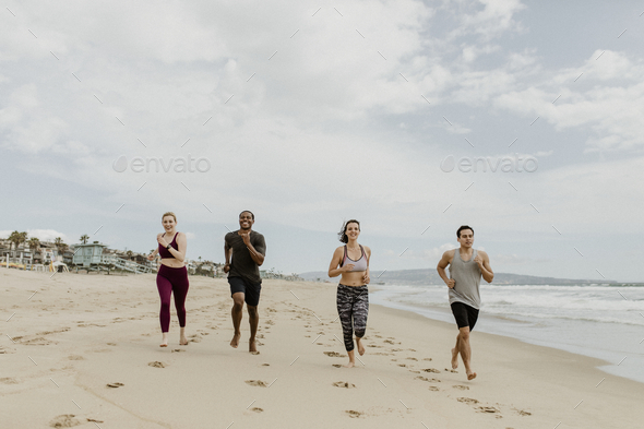 Fit people jogging on the beach Stock Photo by Rawpixel | PhotoDune