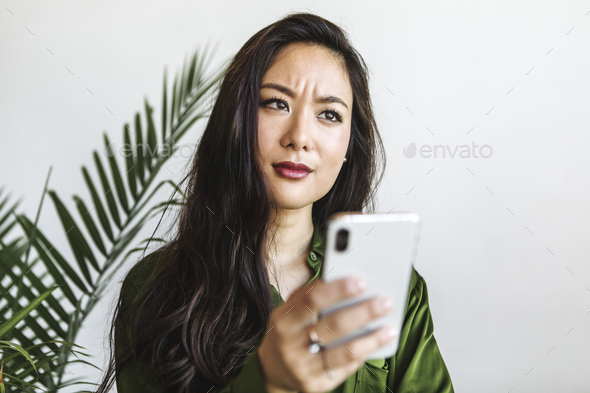 Confused woman reading a text Stock Photo by Rawpixel | PhotoDune