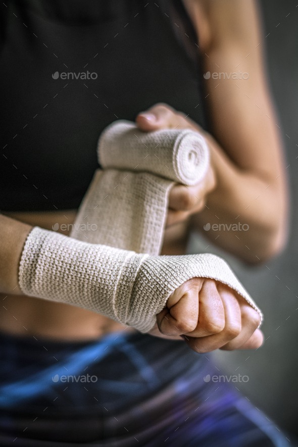Female boxer putting a strap on her hand Stock Photo by Rawpixel ...
