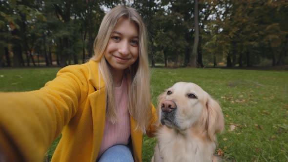 Happy Woman Filming Video While Petting Her French Retriever, Stock Footage