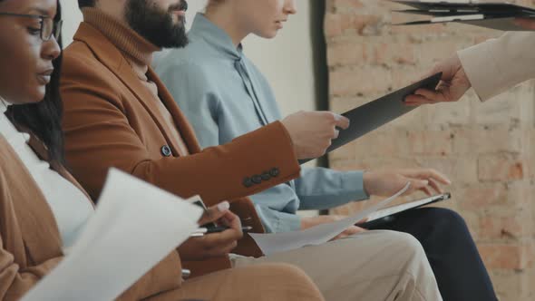 Unrecognizable Manager Handing Out Application Forms, Stock Footage
