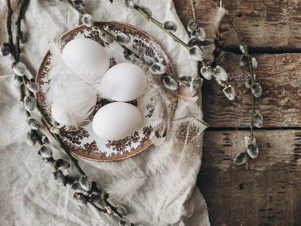 Stylish rustic Easter table setting flat lay. Natural eggs, vintage ...