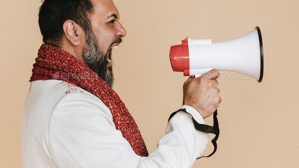 Indian man screaming into a megaphone Stock Photo by Rawpixel | PhotoDune