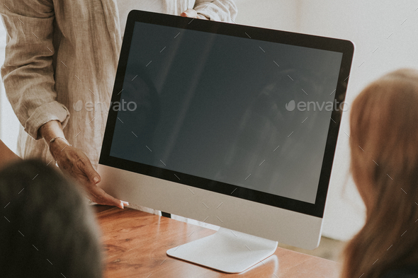 Business people in a meeting using a computer Stock Photo by Rawpixel
