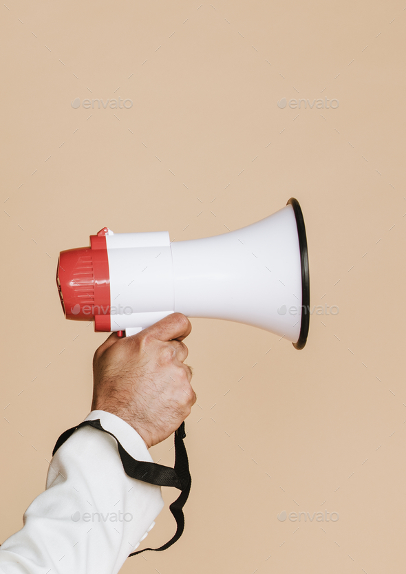 Protester holding a megaphone Stock Photo by Rawpixel | PhotoDune