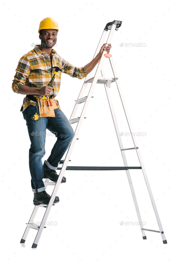 handsome construction worker standing on ladder isolated on white Stock ...