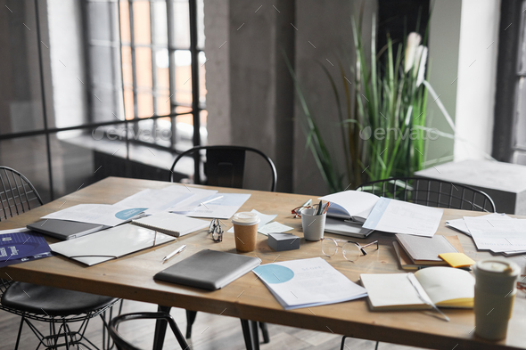 Messy Meeting Table in Office Stock Photo by seventyfourimages | PhotoDune