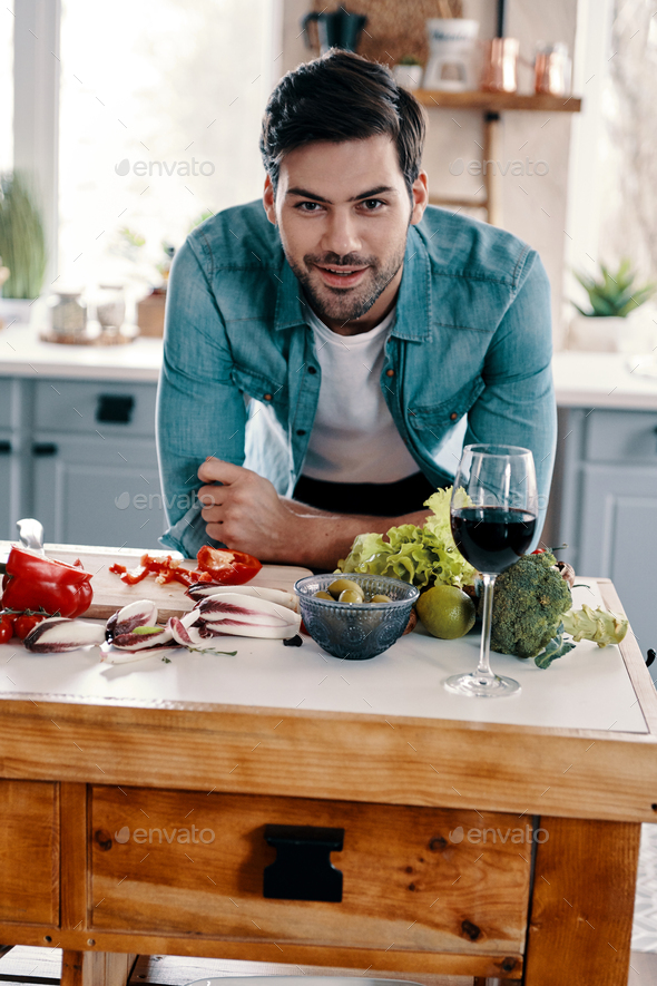 Cooking healthy dinner. Stock Photo by gstockstudio | PhotoDune