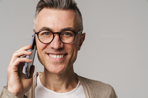 Smiling attractive smart looking man Stock Photo by vadymvdrobot ...