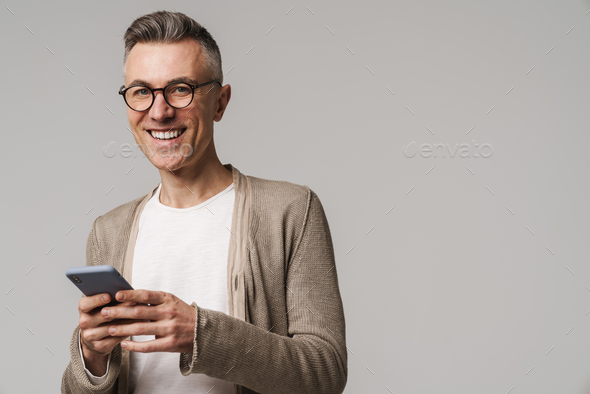 Smiling attractive smart looking man Stock Photo by vadymvdrobot ...