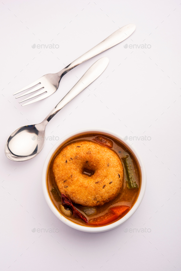 Medu Vada or sambar vada, a popular South Indian food served with ...