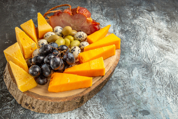 Horizontal view of delicious snack including fruits and foods on a ...