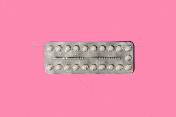Birth control pills on pink Stock Photo by molenira | PhotoDune