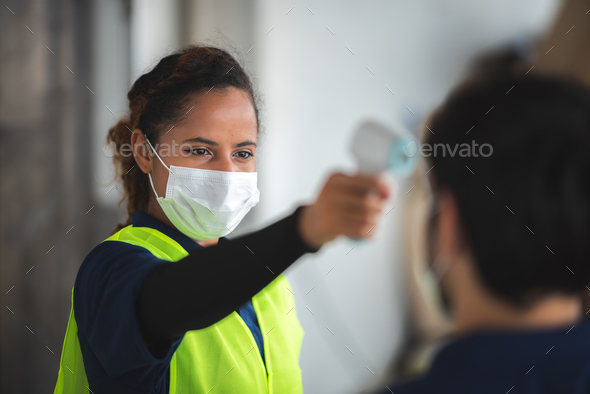 Health check factory personnel using medical digital temperature ...