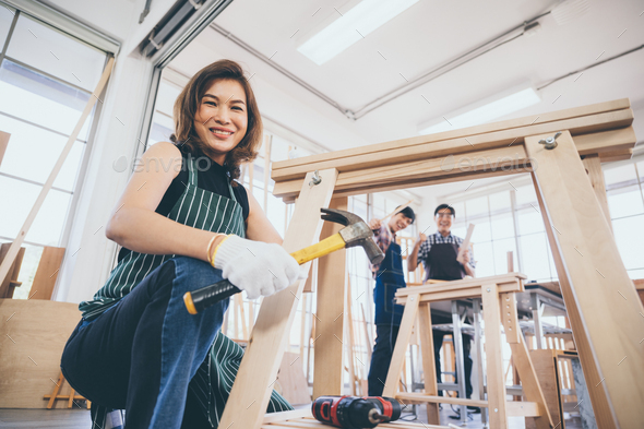 Carpenters team work together creatively, creative carpenter working ...