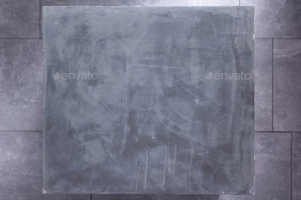 Grey or gray cube table at floor texture. Modern architecture concept ...