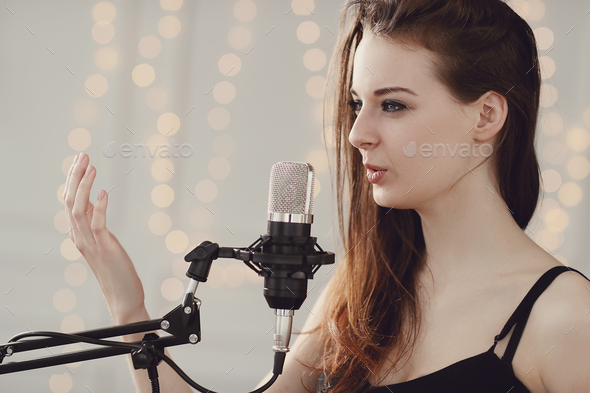 Singer Stock Photo by Microstock_Growth | PhotoDune