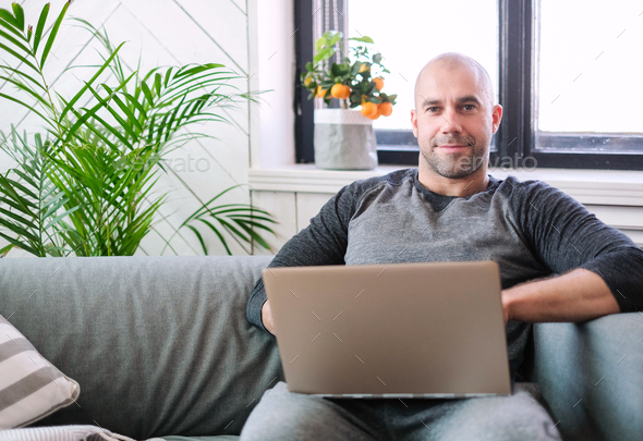 Man at home Stock Photo by Microstock_Growth | PhotoDune