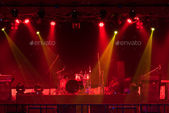 Musical instruments with spotlight on the stage with light ray in ...