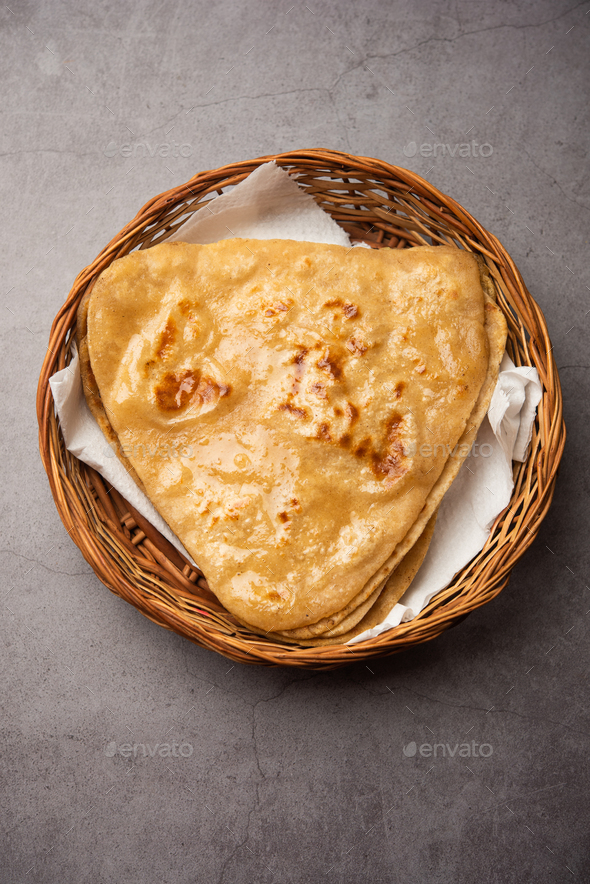 Triangle shape parantha or paratha is an Indian flat bread made with ...